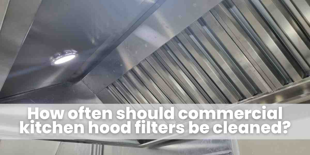 How often should commercial kitchen hood filters be cleaned?